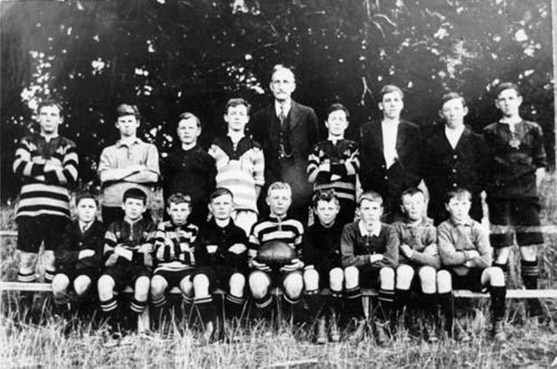 S28 ca 1918-19 Dunsandel football team, after a game with Rakaia, named ...
