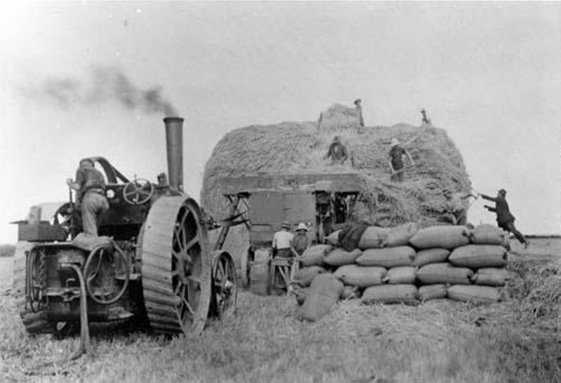 F33 Fred Lill's mill Jack Evans at controls Harry Parris feeding mill ...