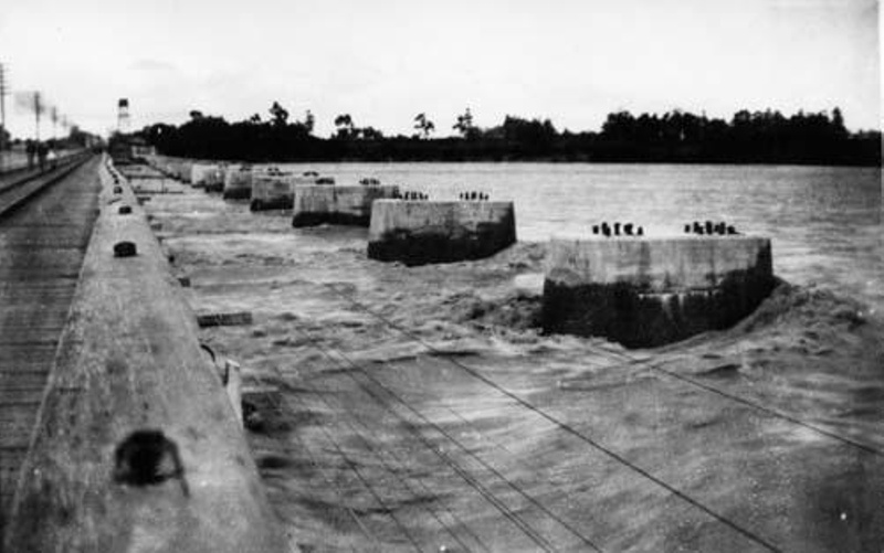 D13 1930's Rakaia river in flood looking south showing new railway ...