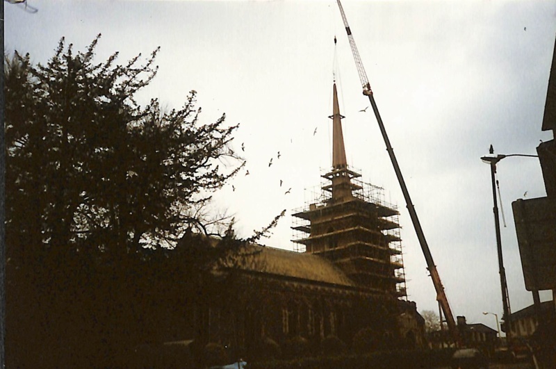 Crane lifting the new spire onto St Peter's and St Mary's Church on ...