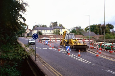 Roadworks on the roundabout of Ipswich Road and Hollingsworth Road; Box ...