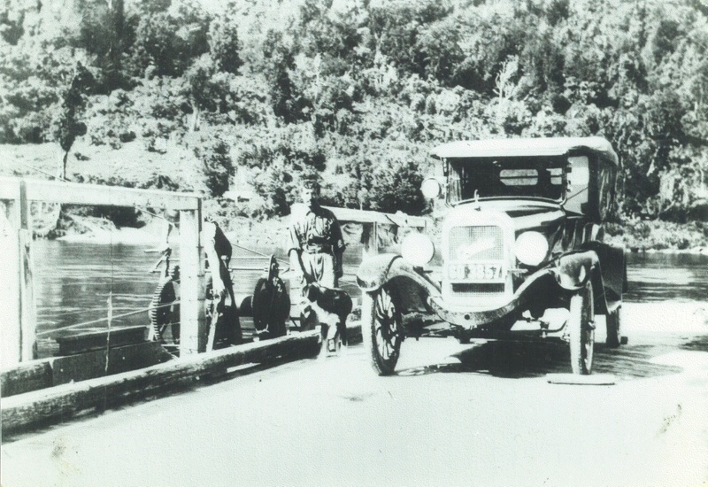 Te Kuha ferry transporting a motor car across the Buller river; KWC-I ...