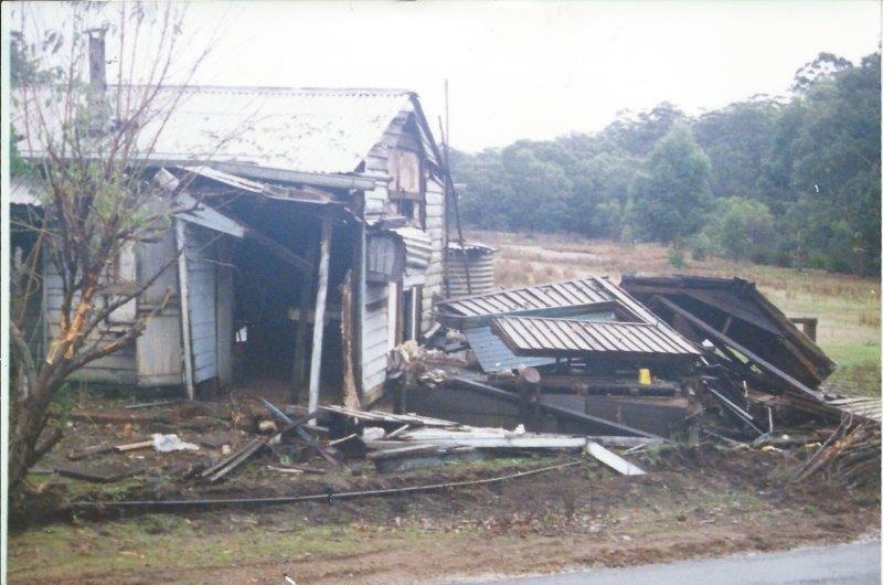 View from the road of Jack's shack with collapsed wall; 1990's; FODV225 ...
