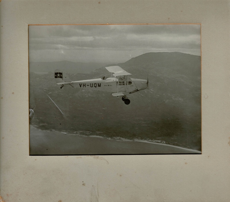 Photograph of DH.83 VH-UQM "Miss Currie" with card border; TAHS.0932 ...