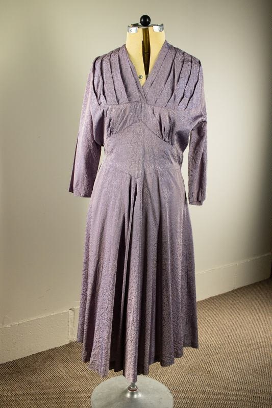 Greyish mauve satin dress, with pleated bodice top and pointed midriff ...