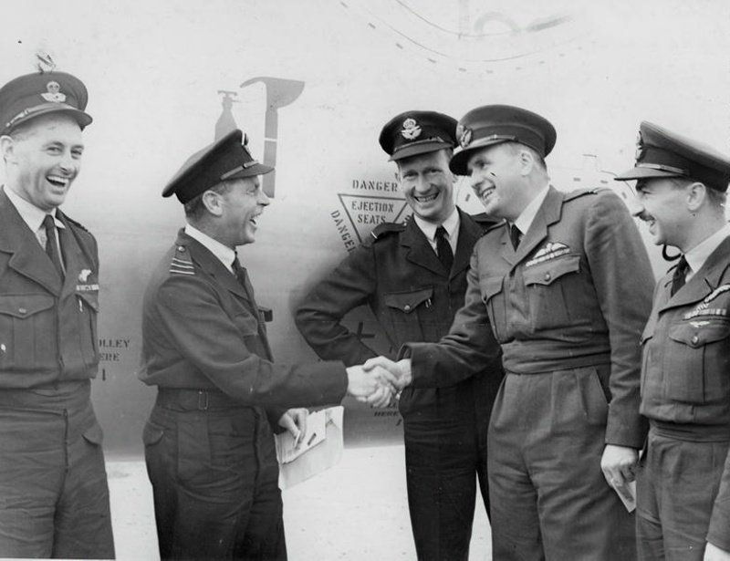 Aviation. Air Force Officers Handshake. Beside a large Aircraft with ...