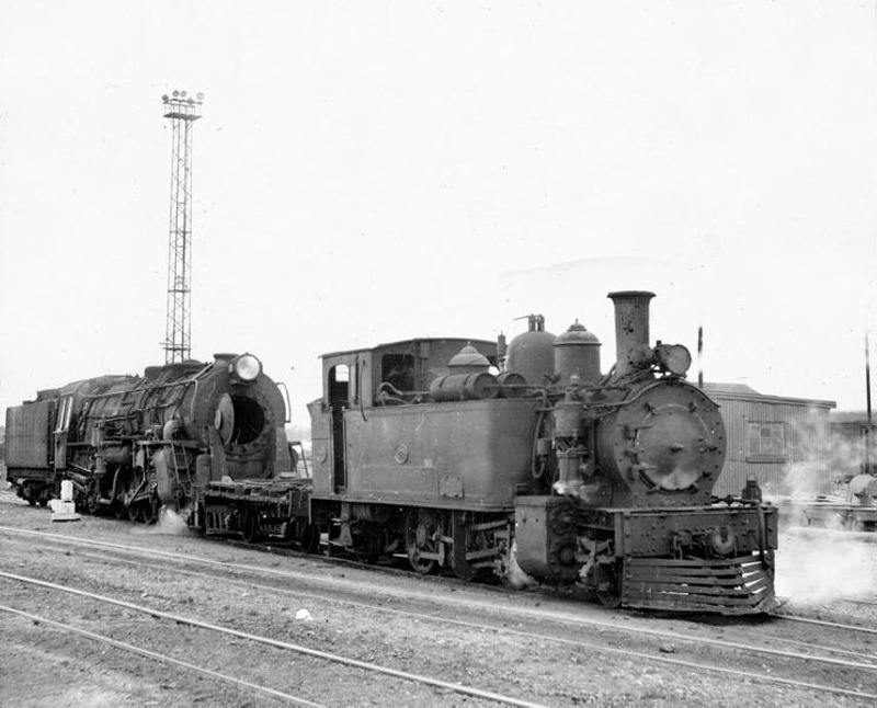 Reverse Image. Railway, Two Steam Locomotive Representatives, at rear ...