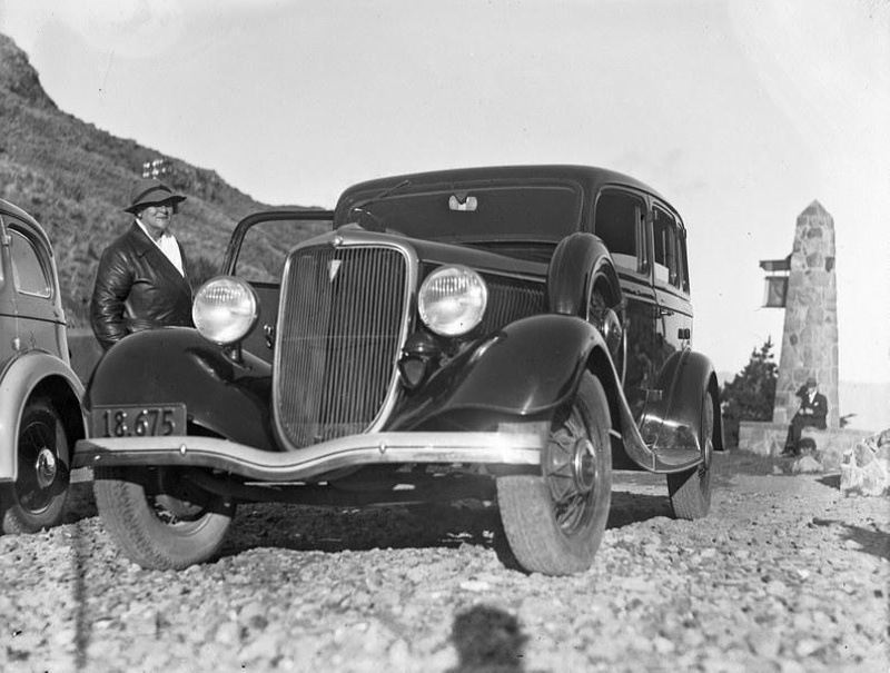 Motor Vehicle, 1934 Ford V8. and lady on Summit Road with one of Harry ...