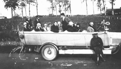 Passengers in an open topped coach; Unknown; c.1925; P022.2 | eHive