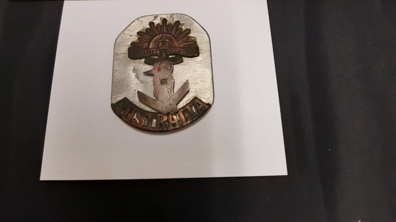 Rising sun badge; 1198 | eHive