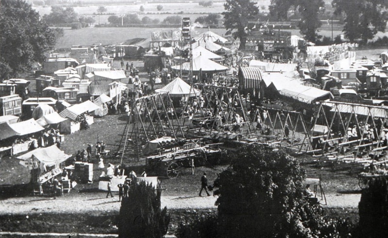 A photograph showing Witney Feast in progress on the Leys circa 1912 ...