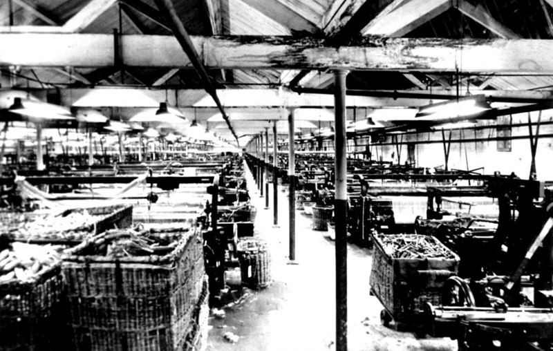 A photograph showing the interior of Witney Mill weaving shed after the ...