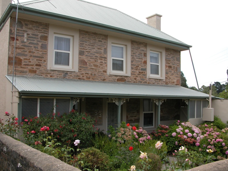 Two story house with stone wall; 1854; 2021.1P078 | eHive