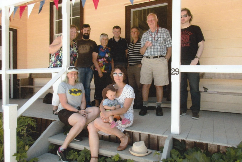 Graham Strachan and family on the steps and verandah of Eckford's ...