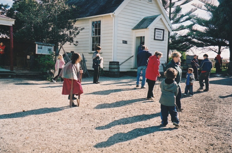 Museum visitors playing with old fashioned toys on a Live Day in Howick ...