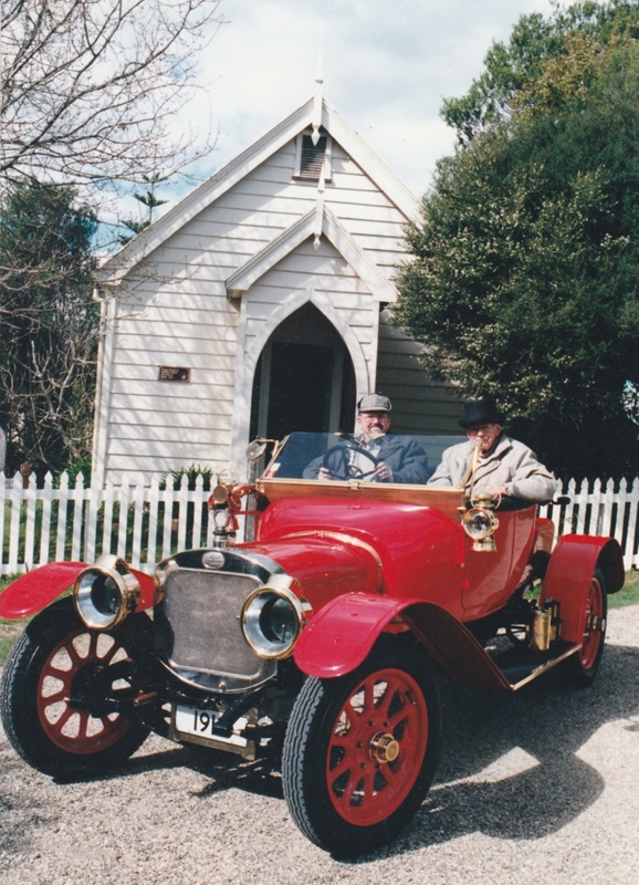 Geoffrey Fairfield, in black top hat, a passenger in the 1912 vintage ...