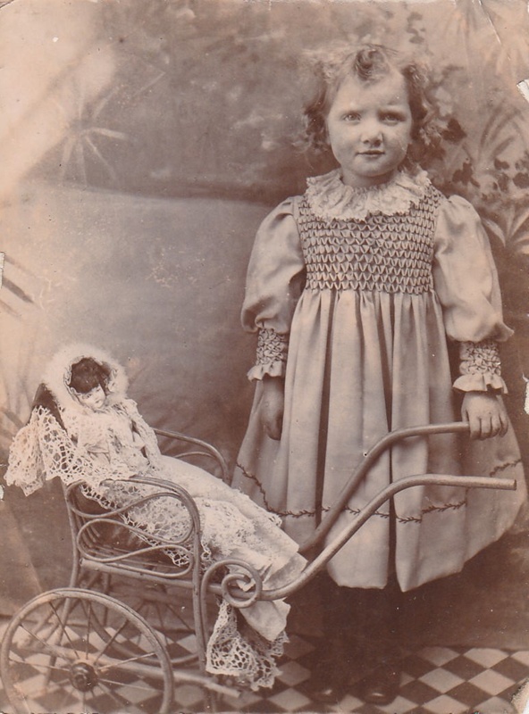 Elsie Clark with a doll in its pram.; 1899; 2012.17.5 | eHive