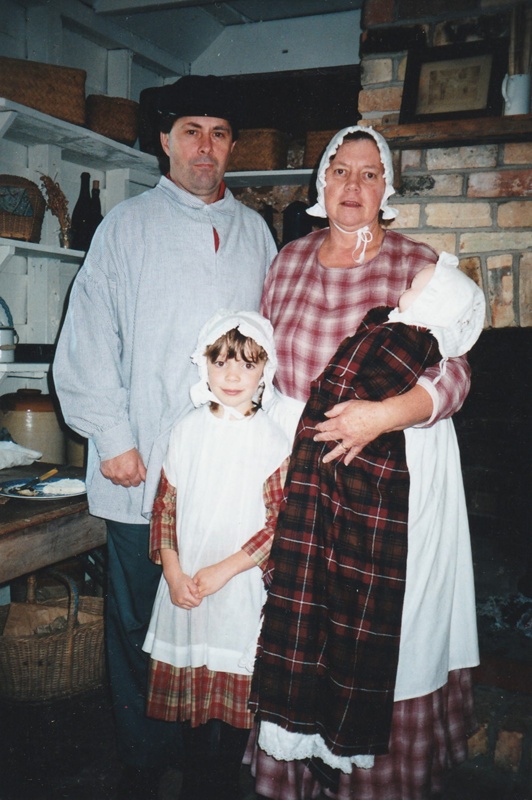 Brenda Scott, in costume, with her nephew and children in White's Store ...