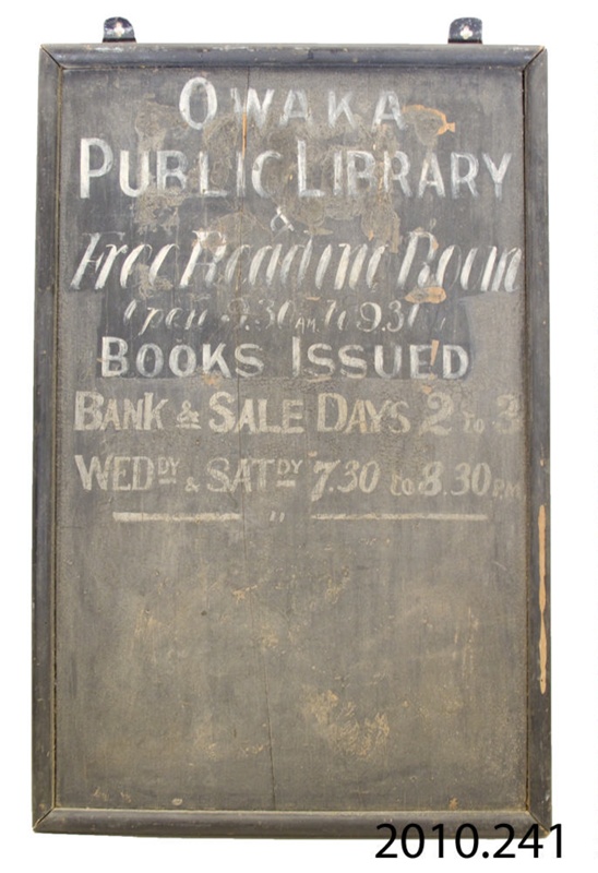 Sign [Owaka Public Library]; Wilson, J T [or I T?]; early 20th century ...