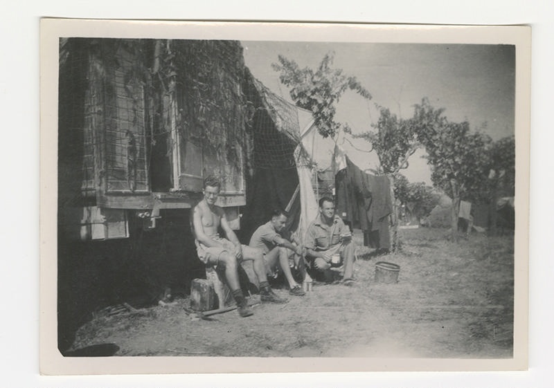 Photograph, Three soldiers taking time out 1944.; Unknown photographer ...