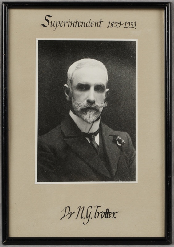 Framed photograph, Reproduction of a photograph of Dr Ninian George ...