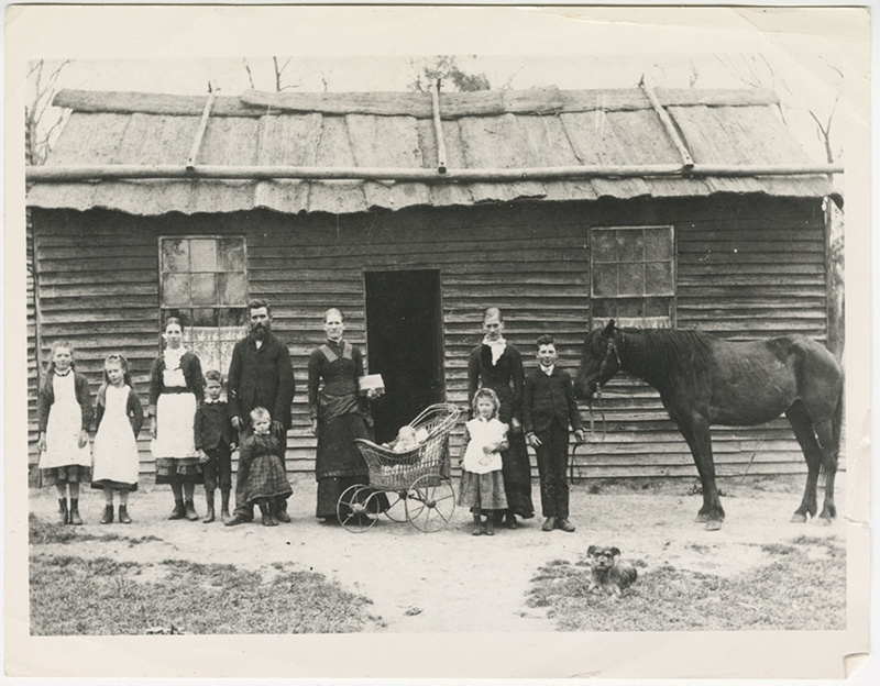 Photograph, A family outside a McCallum & Co. Mill House; Unknown ...