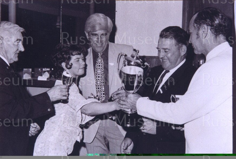Photo: Shows Cup presentation (named) BOI Swordfish Club, 1970's; 99/ ...