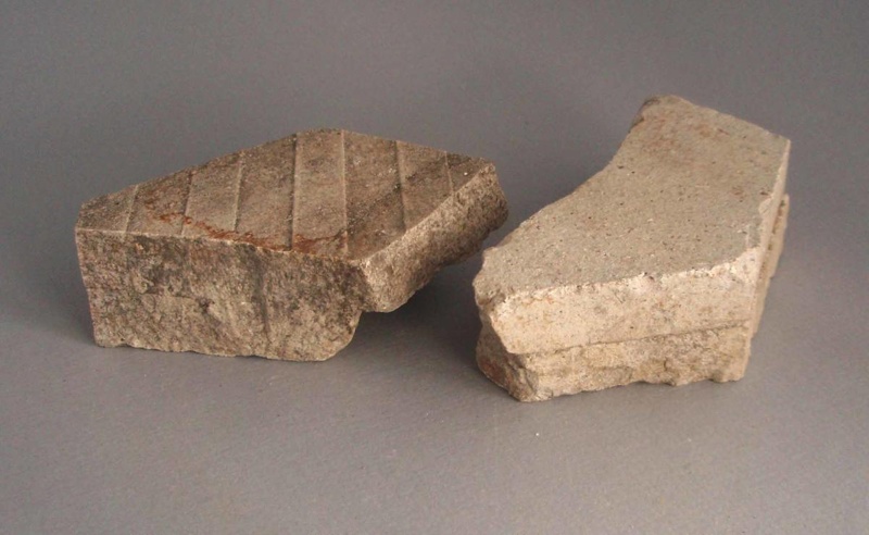 Two fused floor tile fragments; Amalgamated Brick and Pipe Company ...