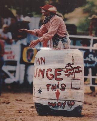 Rodeo clown standing in decorated barrel.; circa 1990; 20038 | eHive