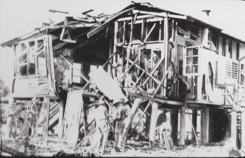 Servicemen in bomb-damaged structure post-Darwin Bombing 1942; Chris ...