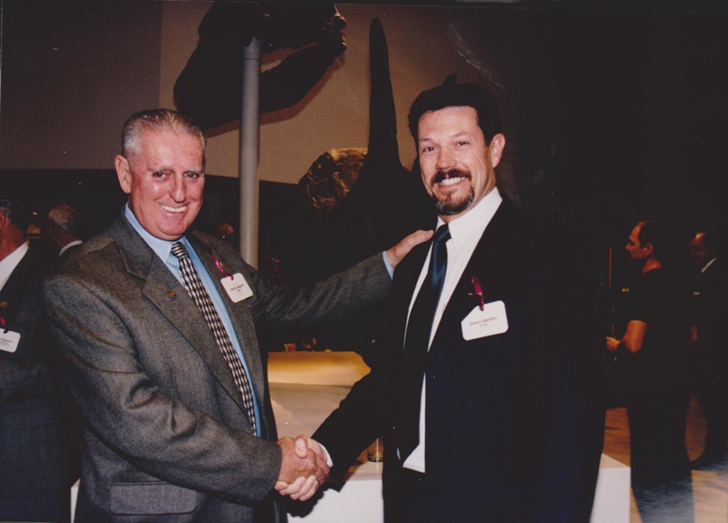 Photograph - Charlie Hassett and Dennis Gardner shake hands at the Dame Mary Dur... | eHive