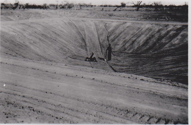 Completed Dam with two men in base; 10223 | eHive