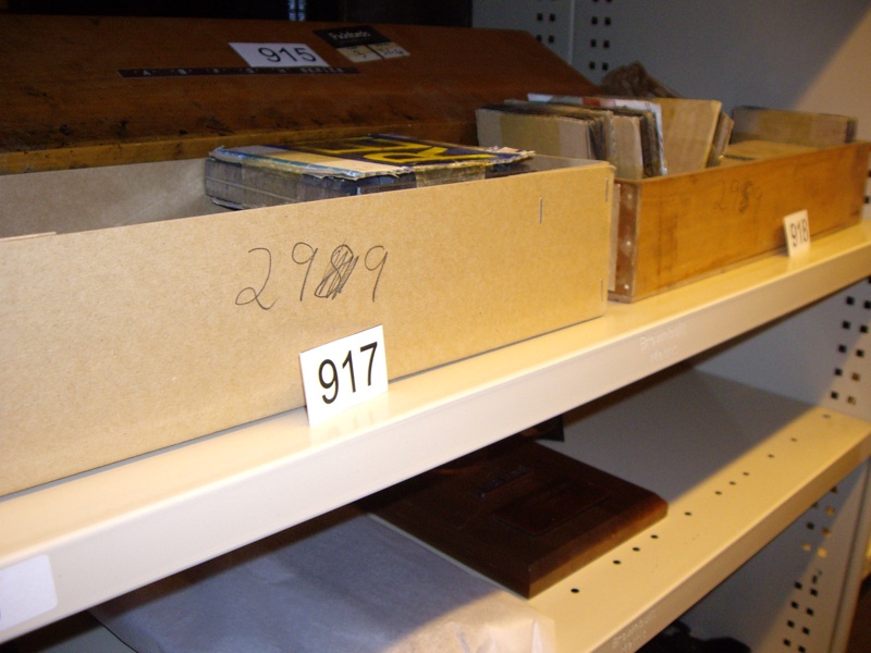 Cardboard box with stamps; 917 | eHive