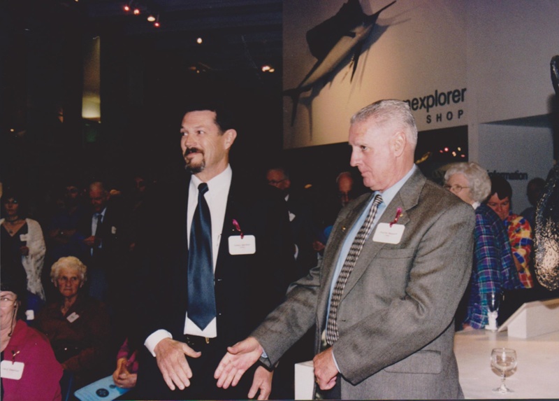Photograph - Charlie Hassett and Dennis Gardner shake hands at the Dame ...