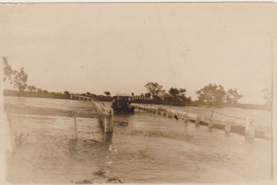 Crossing original bridge over Thomson River, Longreach during floods ...