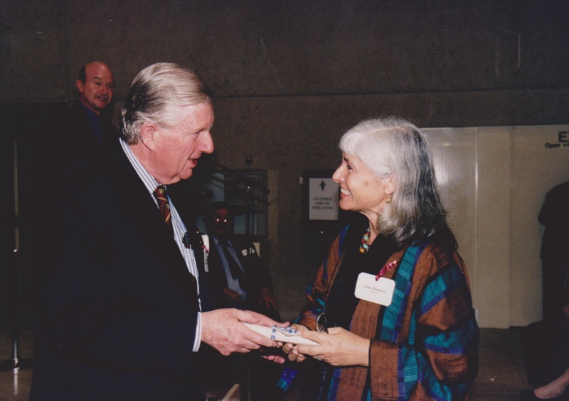 Photograph - Colin Munro hands Helen Barnard her prize at the Dame Mary ...