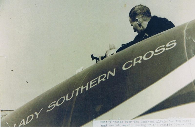 Kingsford Smith checks over the Lockheed Altair "Lady Southern Cross ...