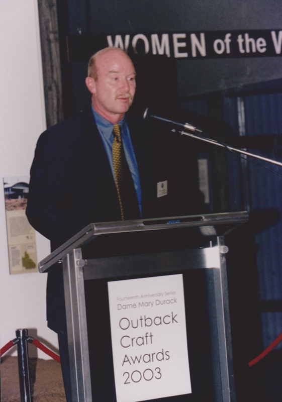 Photograph - Peter Andrews addresses the audience at the Dame Mary ...