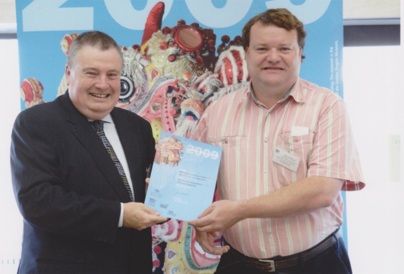 Photograph - ASHOF Curator receiving a certificate; National Library of ...