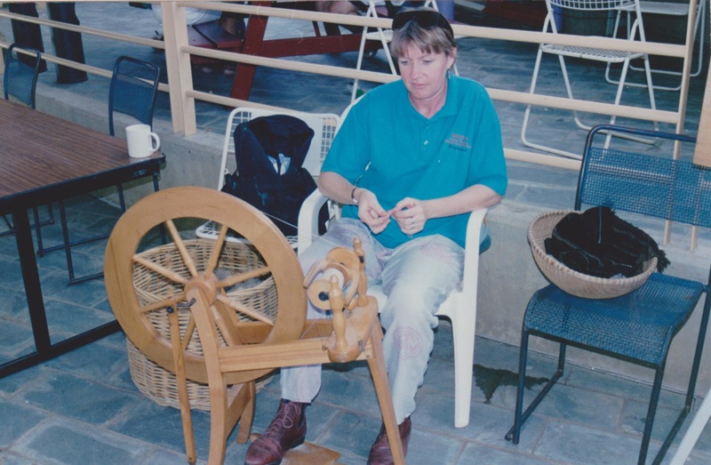 Photograph - Heather Hale spinning wool outside the Stockman's Hall of ...