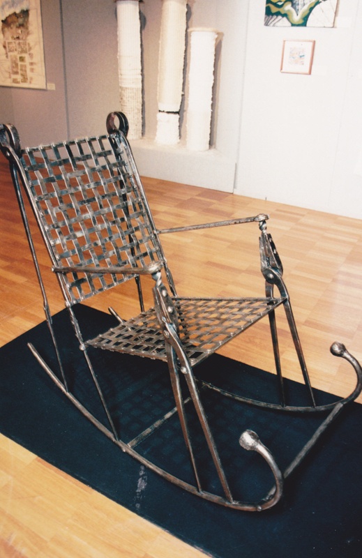 Iron rocking chair with lattice seat and back.; 1995; 19901 | eHive