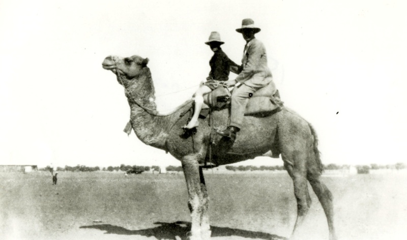 Constable Vincent Rafter and his son on a camel, Bedourie; 1930; PM1568 ...