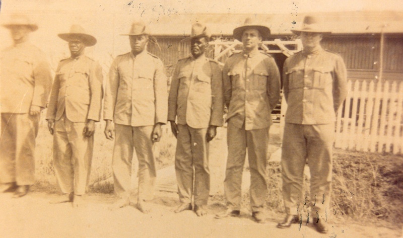 Police officers and trackers outside the Thursday Island police station ... Police officers and trackers outside the Thursday Island police station ...