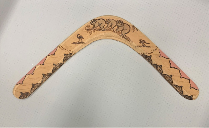 Boomerang with pyrography design, made by Uncle Laddie Timbery; Laddie ...