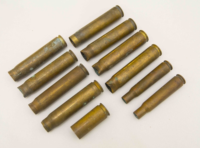 Shell casings, aircraft cannon, brass. For making ship ornaments; 99. ...