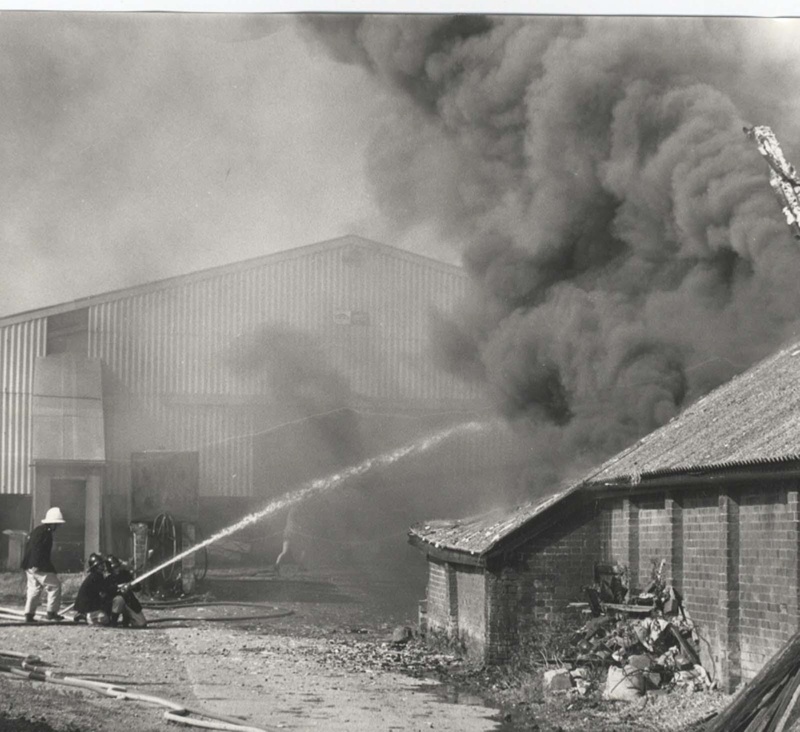 Gelatin print of firefighters fighting a fire; 1975; 9944/807 | eHive