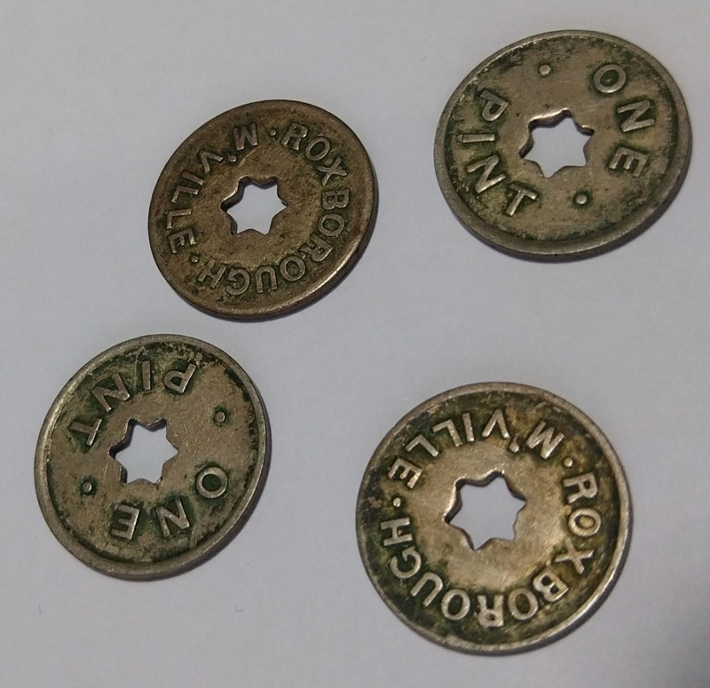 Four milk tokens; 1920-1980; 2022.1.117 | eHive