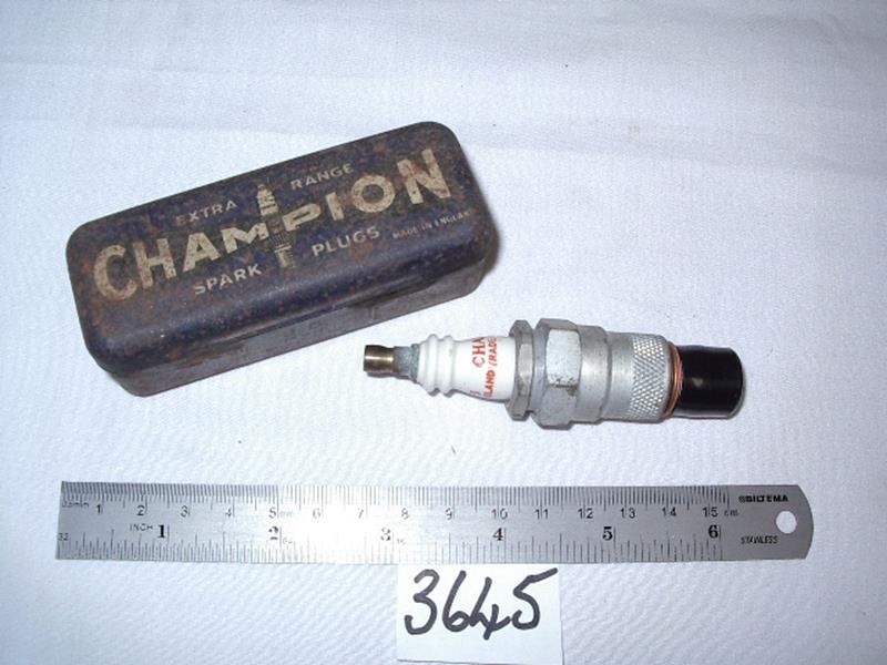 Spark plug in tin, 'Champion'; Champion Spark Plug Co.; 1990; R03645 ...