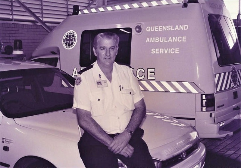 Photograph of Queensland Ambulance Officer & QAS Redland vehicle ...