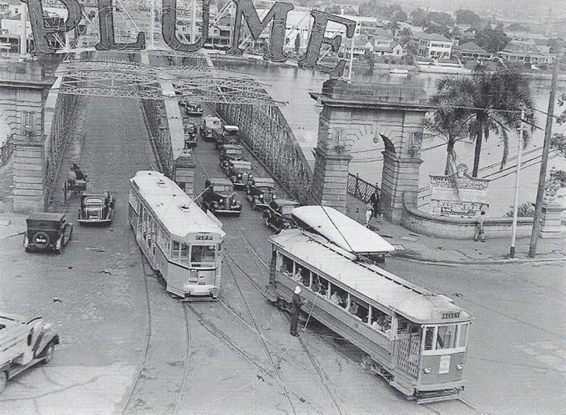 Photograph of Victoria Bridge (1940) showing trams. ; Main Roads Dept ...